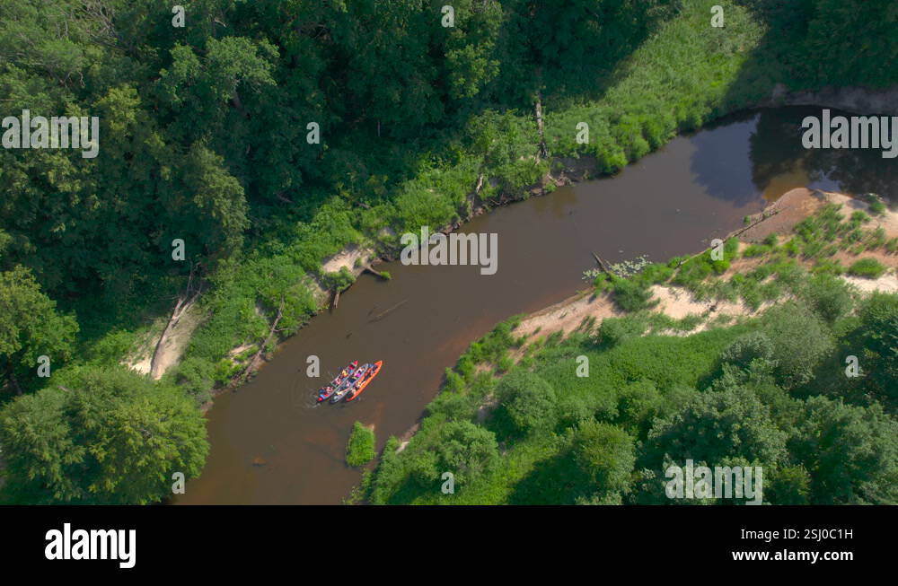 Kayak tourism on a wild river and its tributaries flowing through a ...