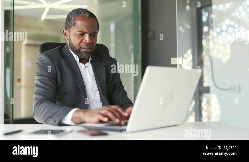 Frustrated man complaining about poor performance of computer program ...