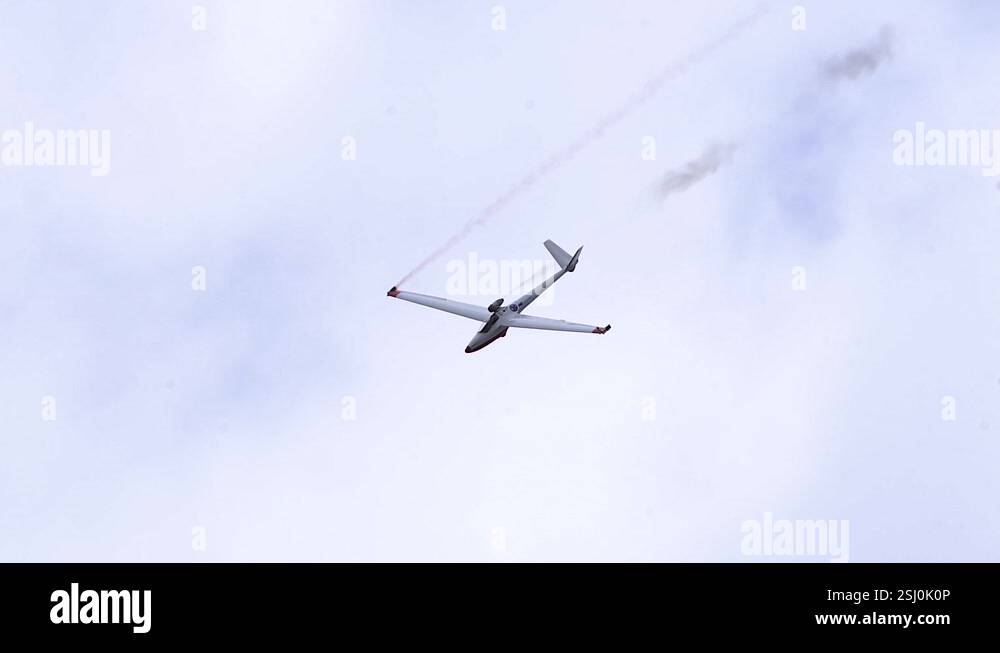 Jet-powered Sailplane Glider Descending In The Sky During Aerobatic ...