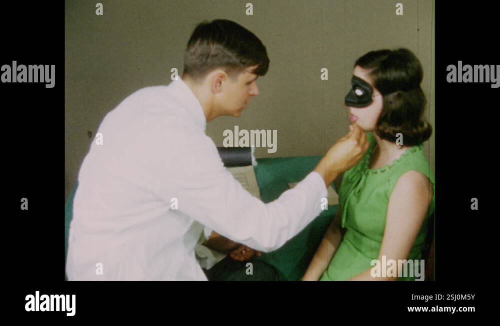1960s: Doctor touches patient's tongue with slide. Doctor places slide ...