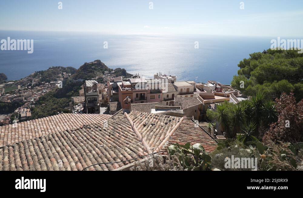 Coastline and rooftops of Castelmola, Castlemola, Sicily, Italy ...