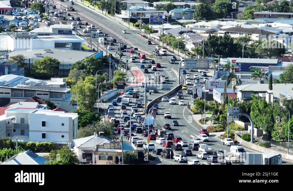 Establishing aerial shot of Brisbane's heavy traffic on Gympie Road in ...
