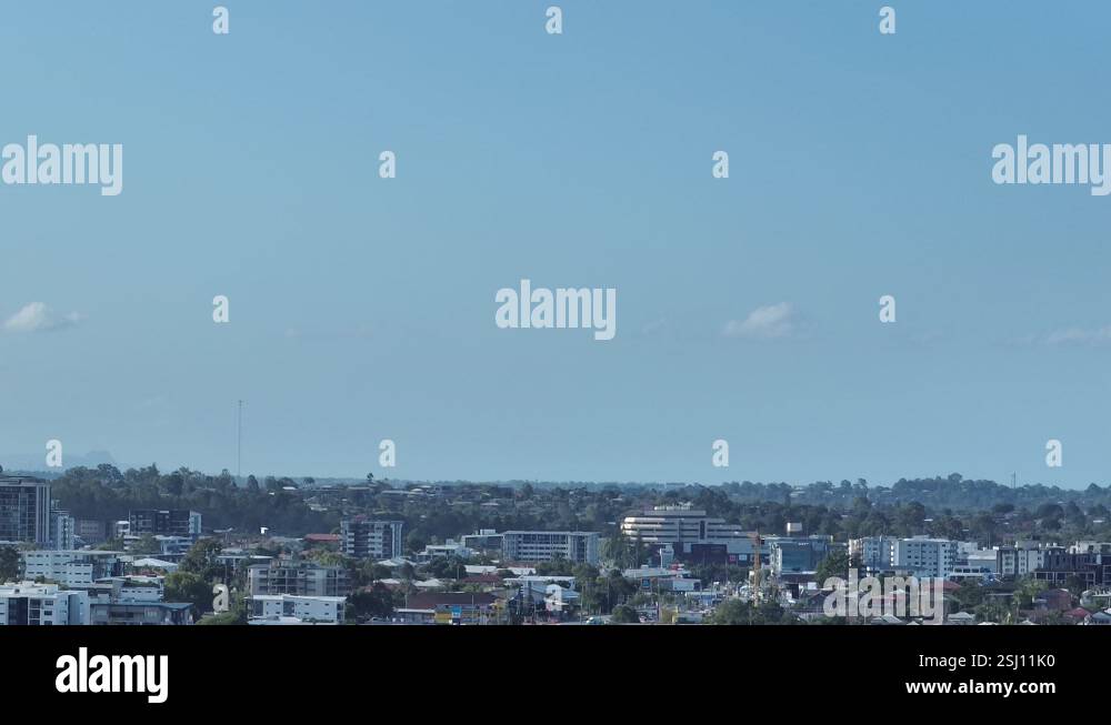 Establishing aerial shot of Brisbane's heavy traffic on Gympie Road in ...