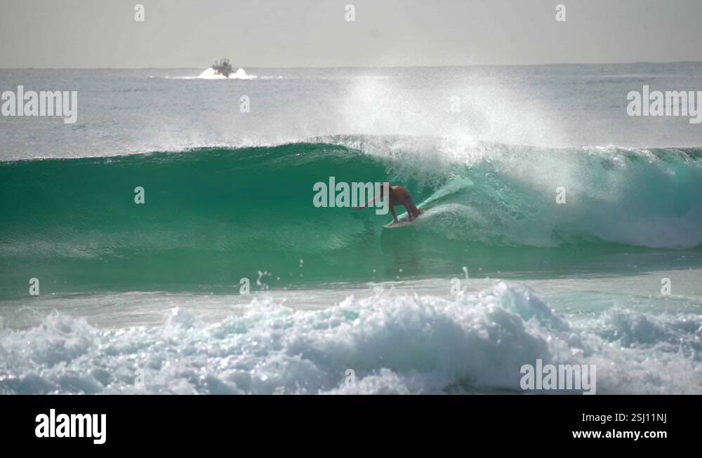 Surfer taking a barrel wave, Sunrise, Slow motion, Snapper Rocks ...