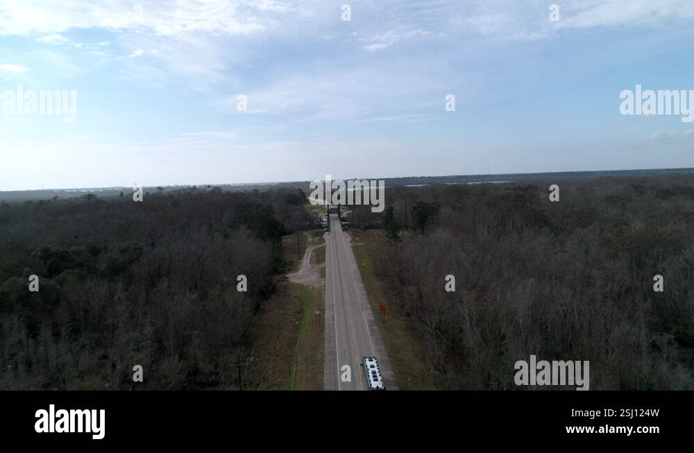 Aerial Forward Shot Of Recreational Vehicle Moving Towards Bridges ...