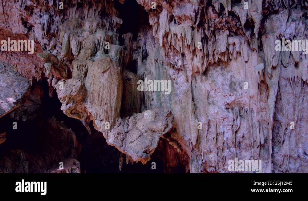 Very closeup footage of a rock formation, stalactites, stalagmites, on ...