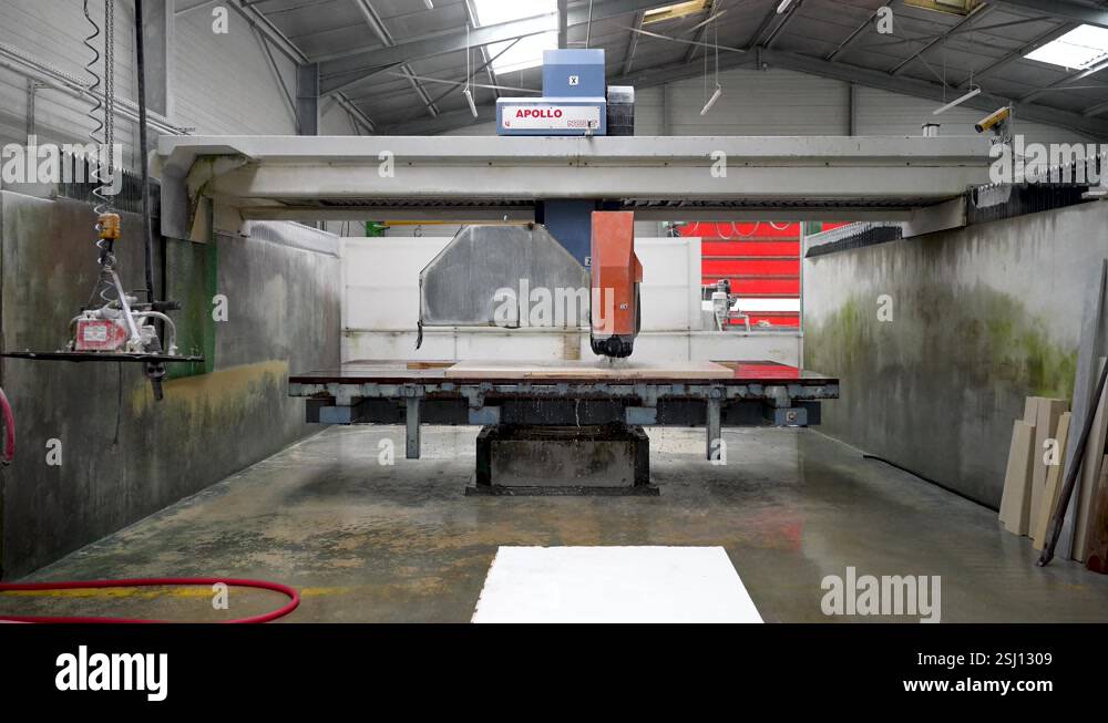 Apollo robotic saw cutting limestone slab accurately, Wide shot Stock ...