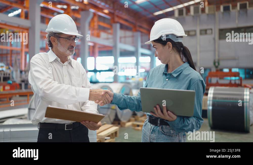 Two engineer manager leader and woman assistant holding laptop and ...