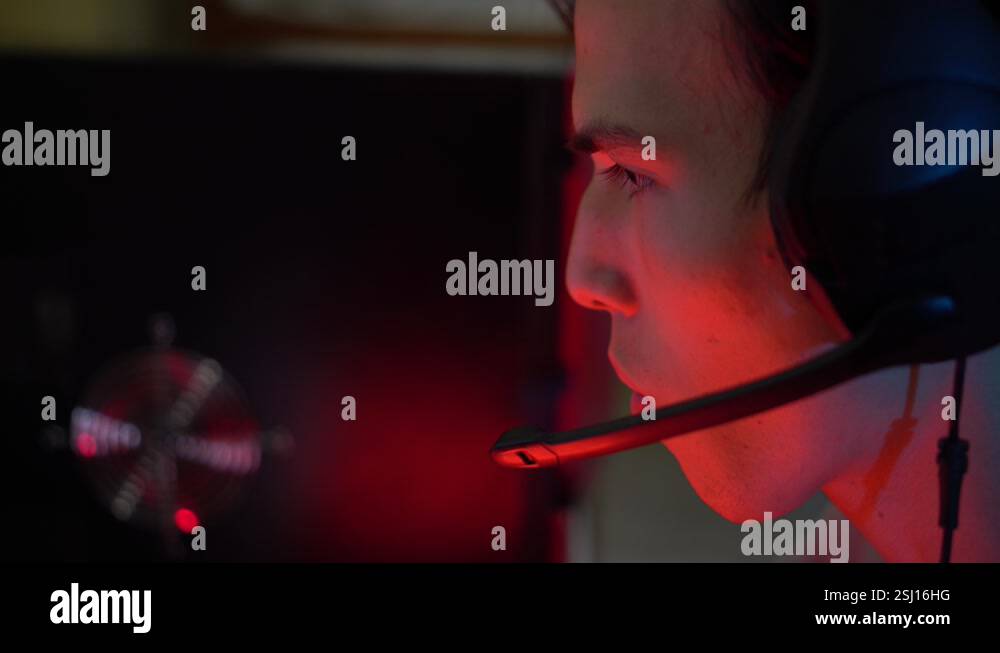 Portrait of the Young Handsome Pro Gamer Playing in Online Video Game ...