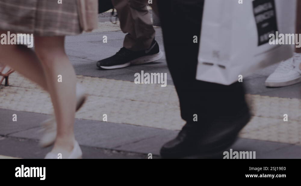 Pedestrians' Feet On A Busy Street Stock Video Footage - Alamy