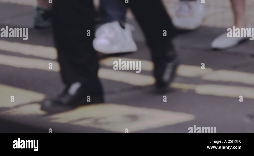 Pedestrians' Feet On A Busy Street Stock Video Footage - Alamy