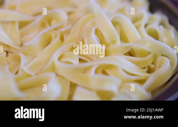 dry pappardelle pasta, rotation in circle. handmade pasta, Turning ...