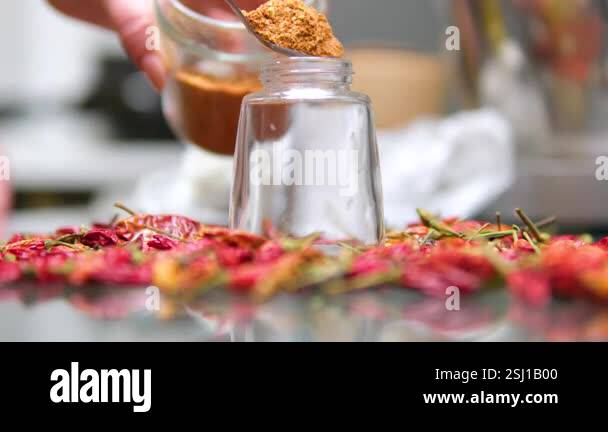 grind red chili pepper woman hands added ingredients like salt and ...