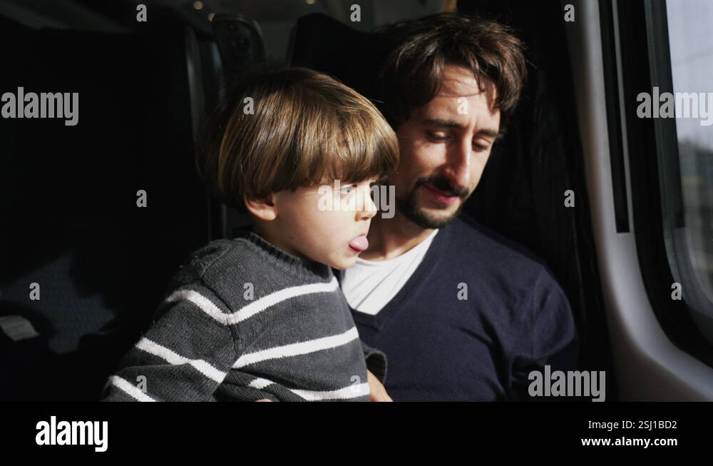 Father and child traveling by train. Dad bonding with little boy son ...