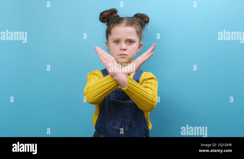 Angry preteen girl kid say No hold palm folded crossed hands, warning ...