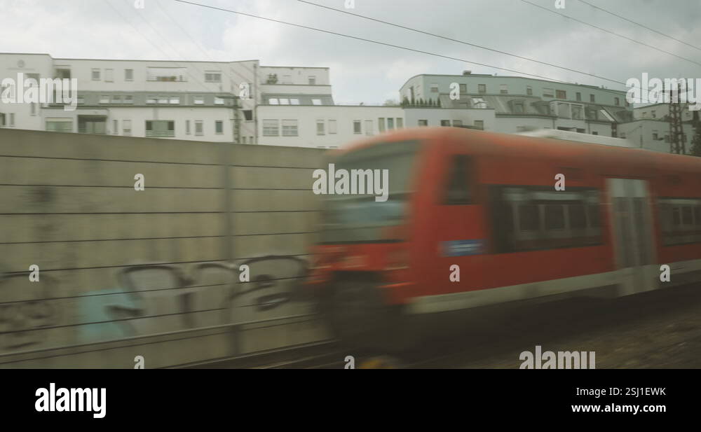 Traveling through Germany in a Deutsche Bahn train, one can admire the ...
