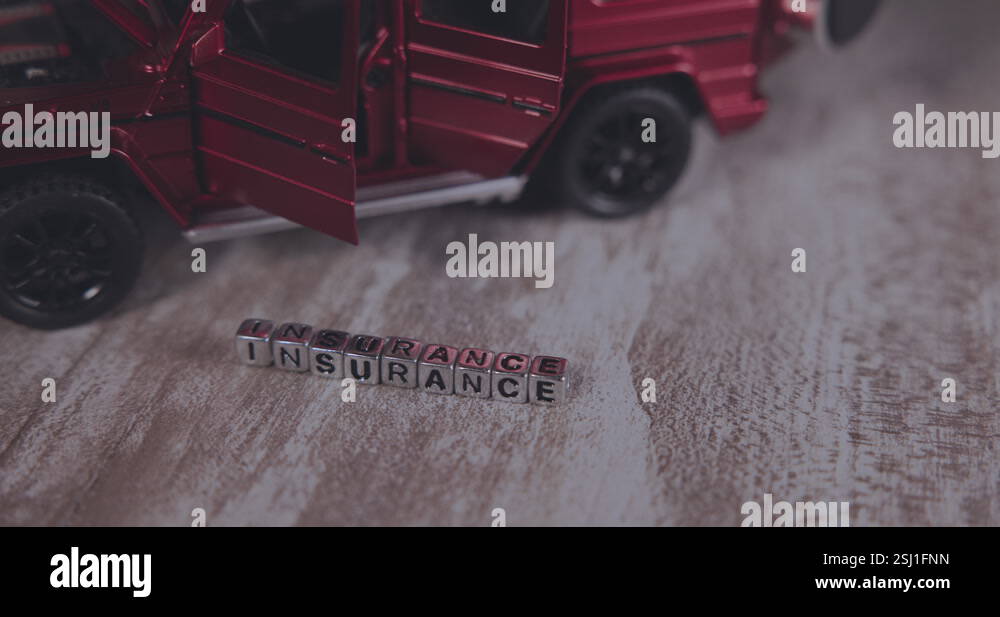 The Inscription Insurance On Cubes Near The Red Car Stock Video Footage ...