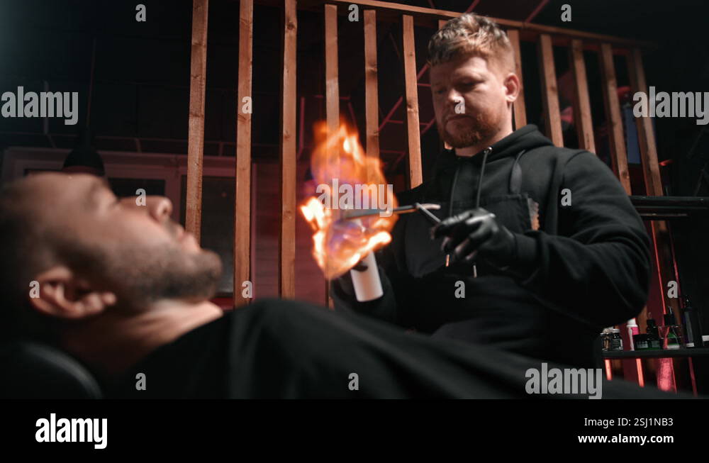 Skill male barber spray burning flame treatment shaving razor customer ...