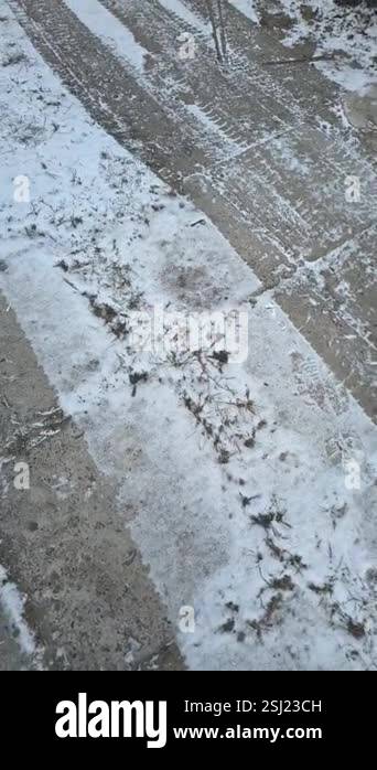 tire tracks in ice. tire tread marks on the ground. tire tread marks on ...