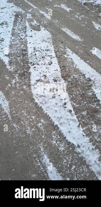 tire tracks in ice. tire tread marks on the ground. tire tread marks on ...