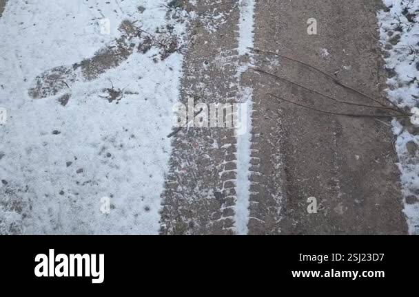 tire tracks in ice. tire tread marks on the ground. tire tread marks on ...