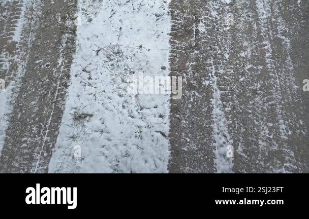 tire tracks in ice. tire tread marks on the ground. tire tread marks on ...