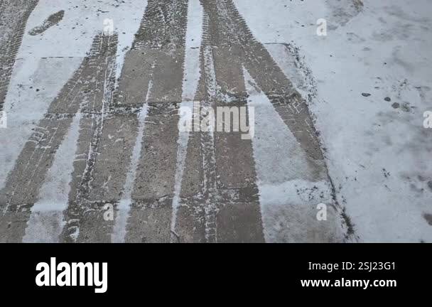 tire tracks in ice. tire tread marks on the ground. tire tread marks on ...