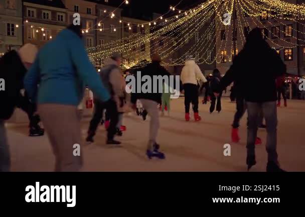 Warsaw, Poland, January 25, 2025 - Evening ice skating in Old Town ...