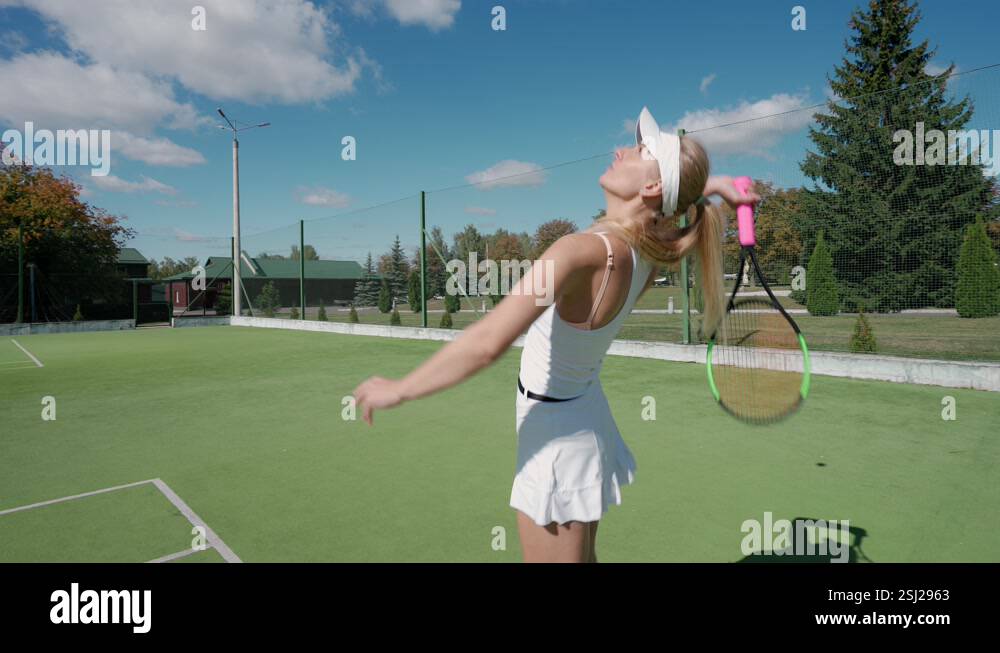 Pro tennis player hits the ball with a racket, practice game on the ...