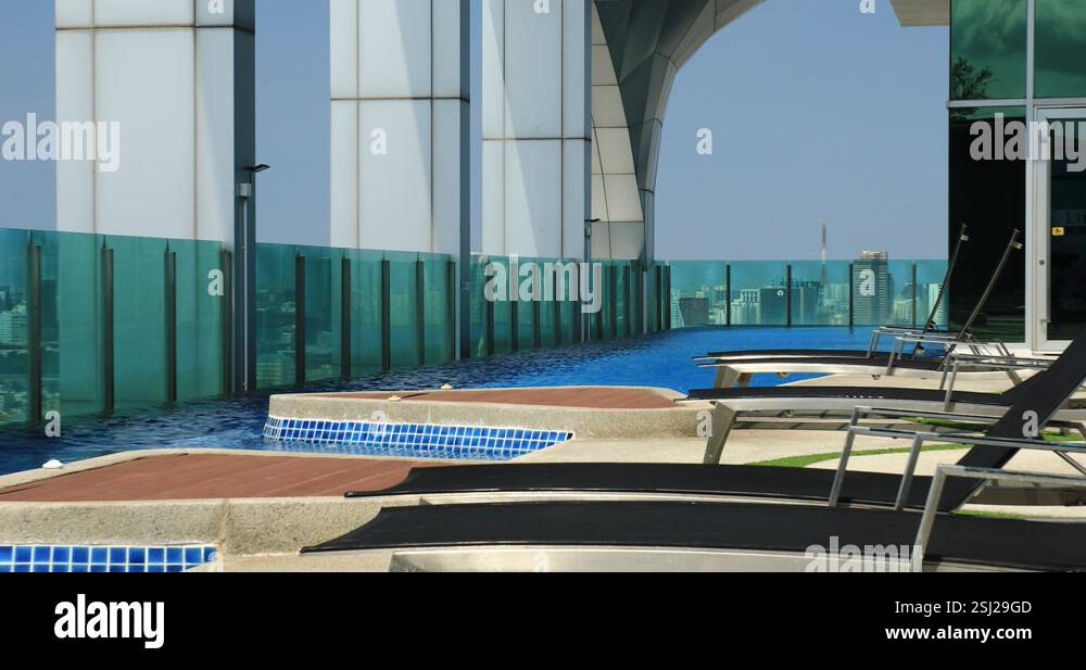 Low Angle with Camera Pull Out to Reveal Infinity Swimming Pool and ...