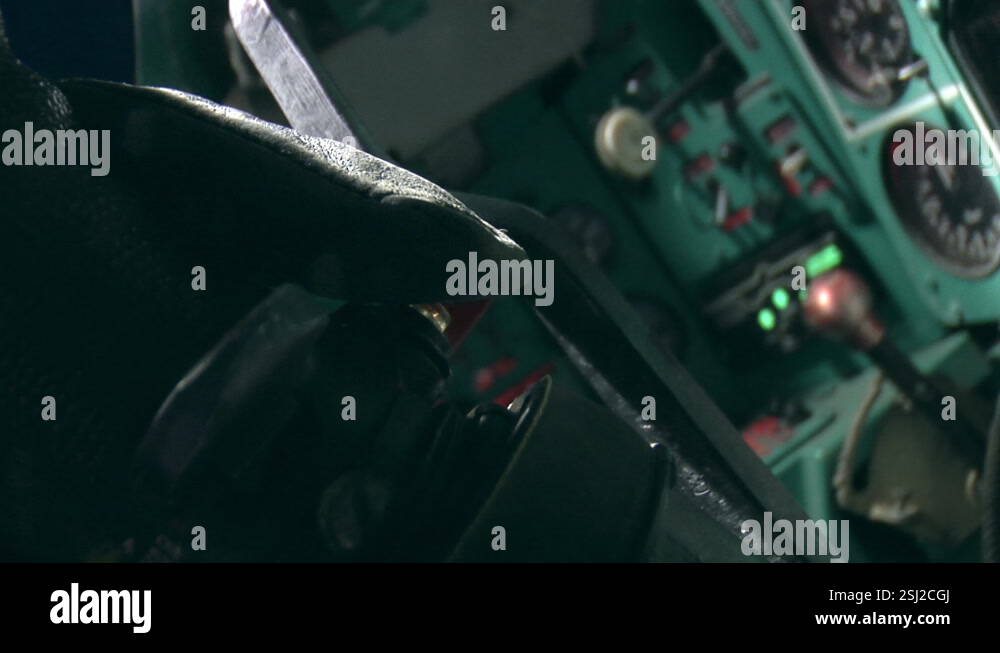 Pilot holding aircraft joystick Stock Video Footage - Alamy