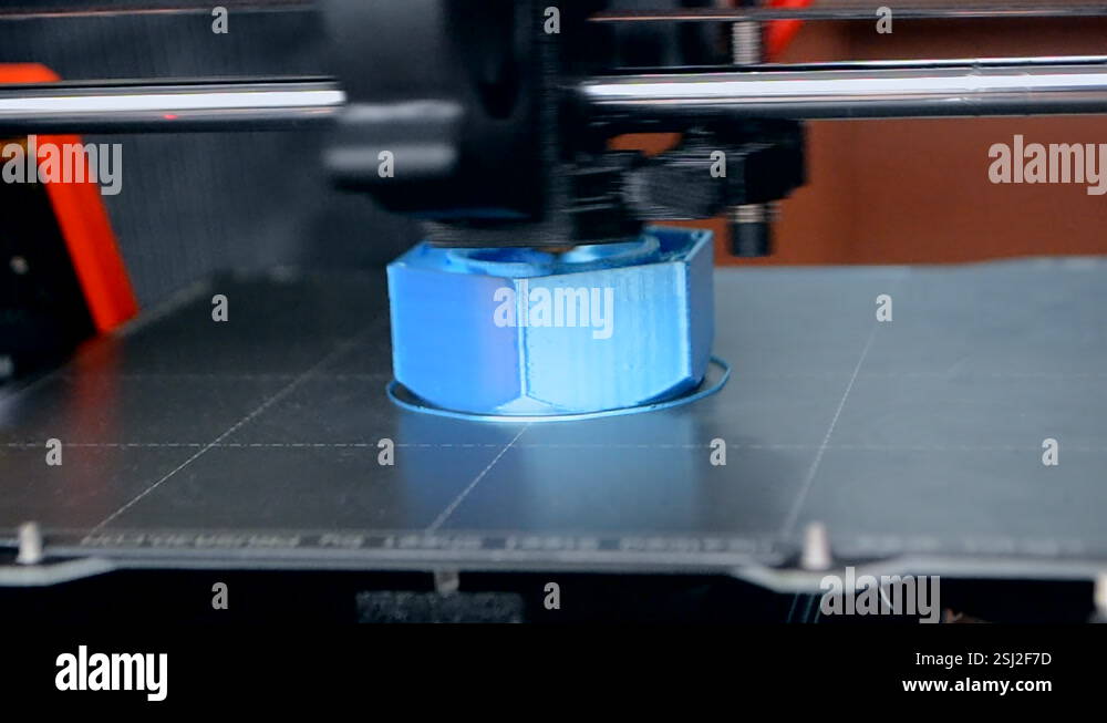 3D printer. 3d printer printing close-up. Molten plastic flowing out of extruder Stock Video ...