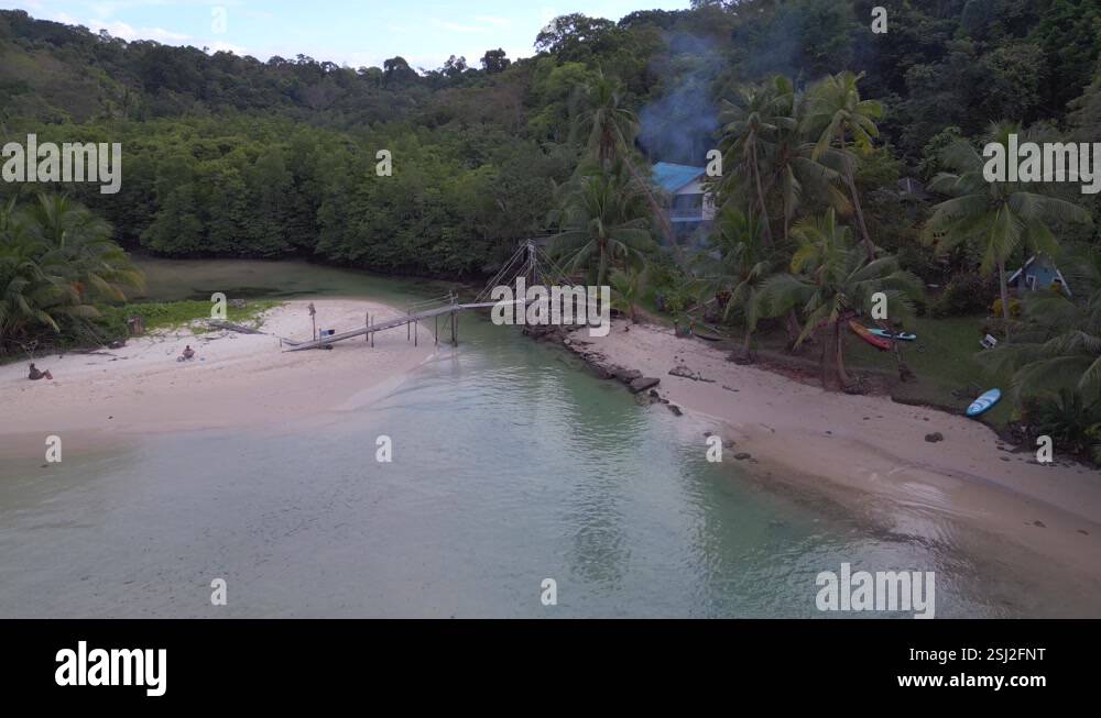 Lagoon with self made bamboo bridge on beach huts. Nice aerial view ...