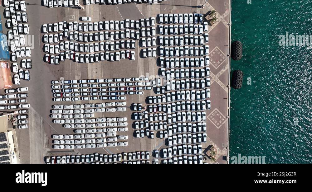 Aerial footage of Eilat sea port in the red sea. Cargo ships anchor in ...