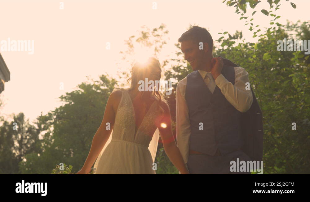 LENS FLARE, PORTRAIT: Gorgeous golden sunlight illuminating smiling ...