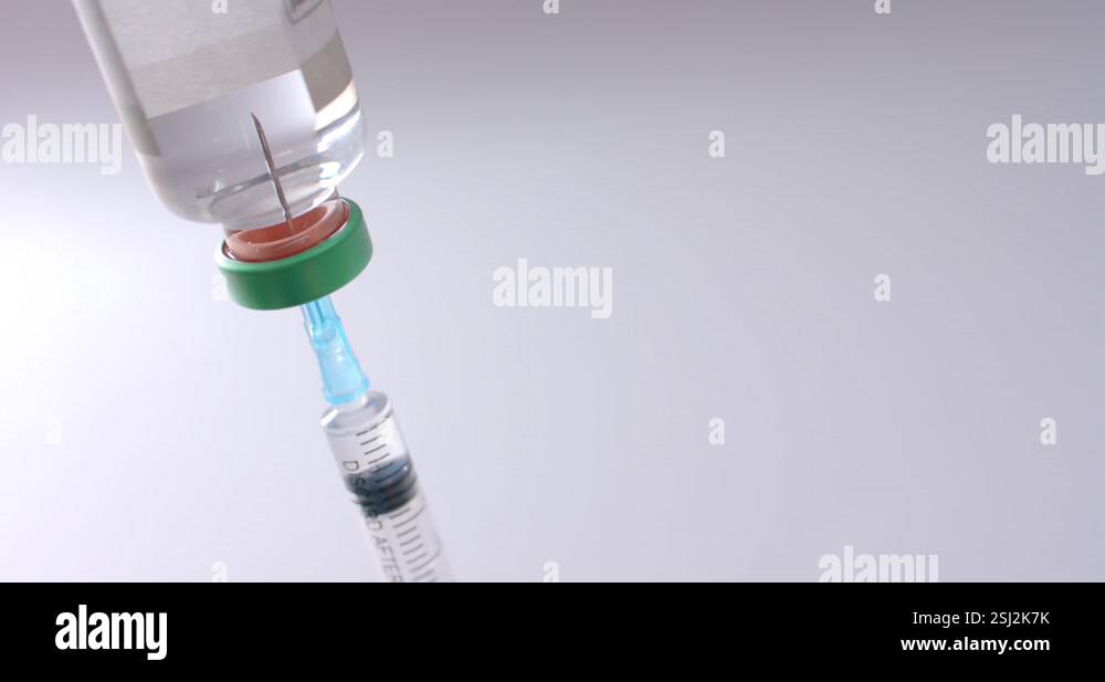 Close up of insulin vial and syringe on grey background with copy space ...