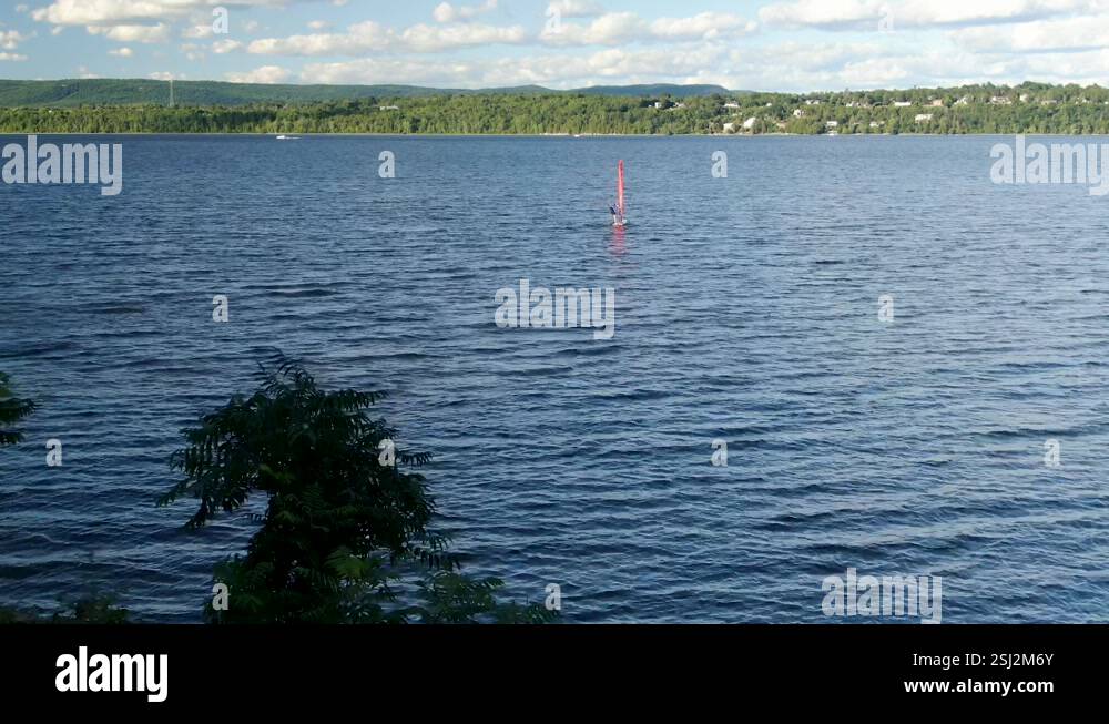 Aerial view of a paddle boarder sailing on the Ottawa river with ...