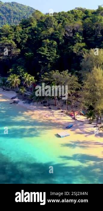 Experience the serene shores of Koh Wai Island in Thailand, where ...
