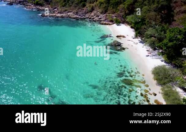 Explore the pristine shores of Koh Wai Island, where crystal clear ...