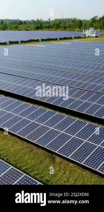 Vast fields covered in solar panels reflect the suns rays in Thailand ...