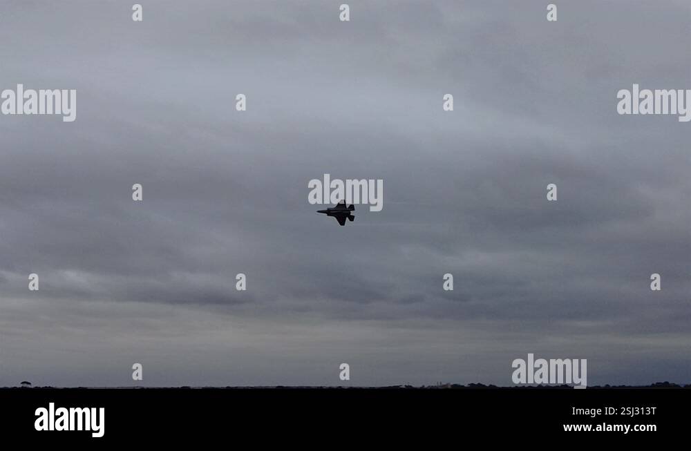 Lockheed Martin F-35A Lightning II Jet Plane Flying By Rolling And ...