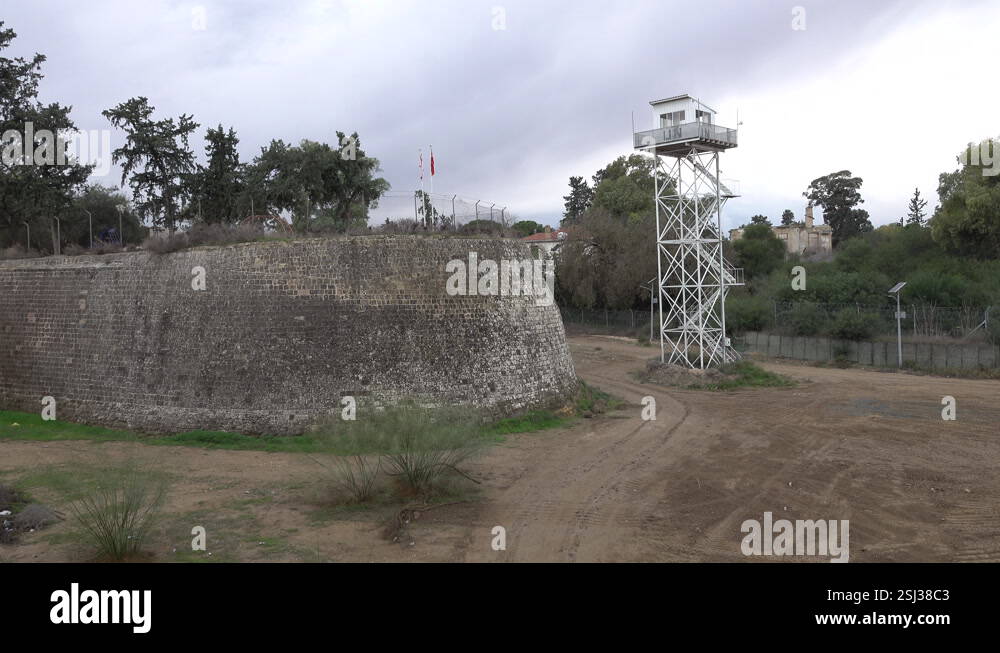 United Nations watchtower and historic city walls in Buffer Zone ...