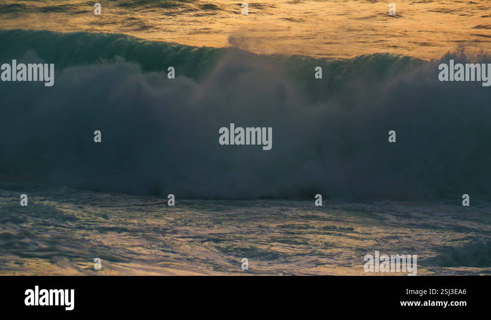 Sea wave breaking shore in early morning closeup. Powerful surf foaming ...