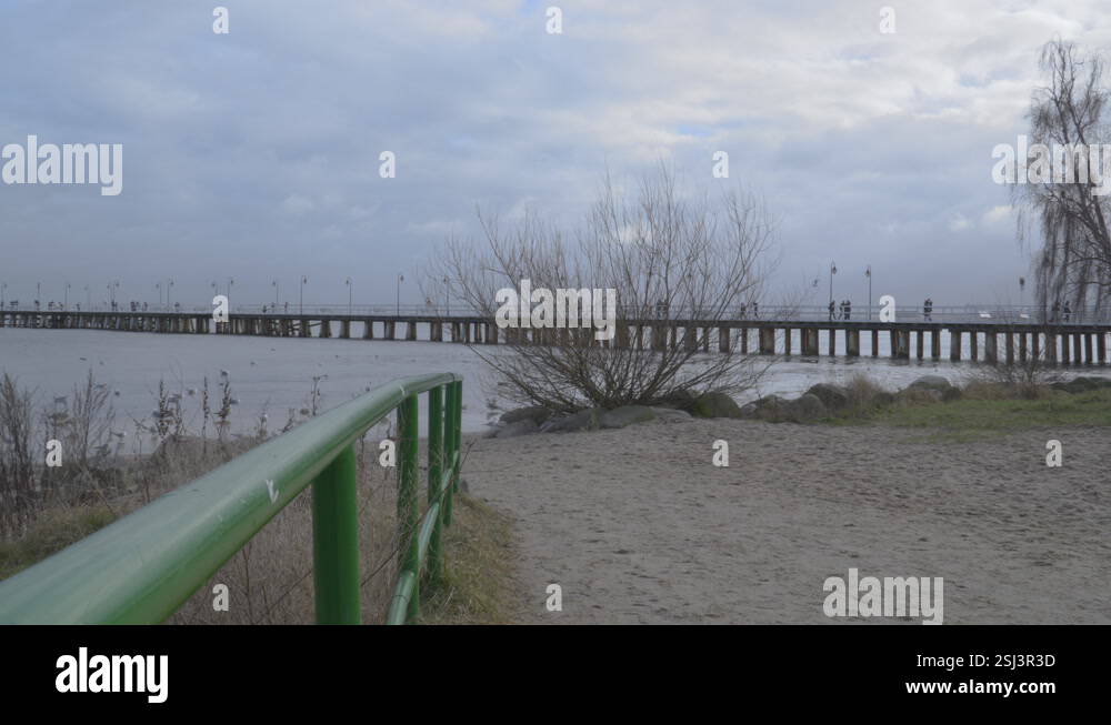 A safety barrier on the beach in Gdynia Redlowo. In the distance a ...