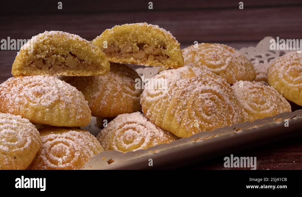 Traditional eid maamoul or mamoul cookies with dates, nuts, and jam ...