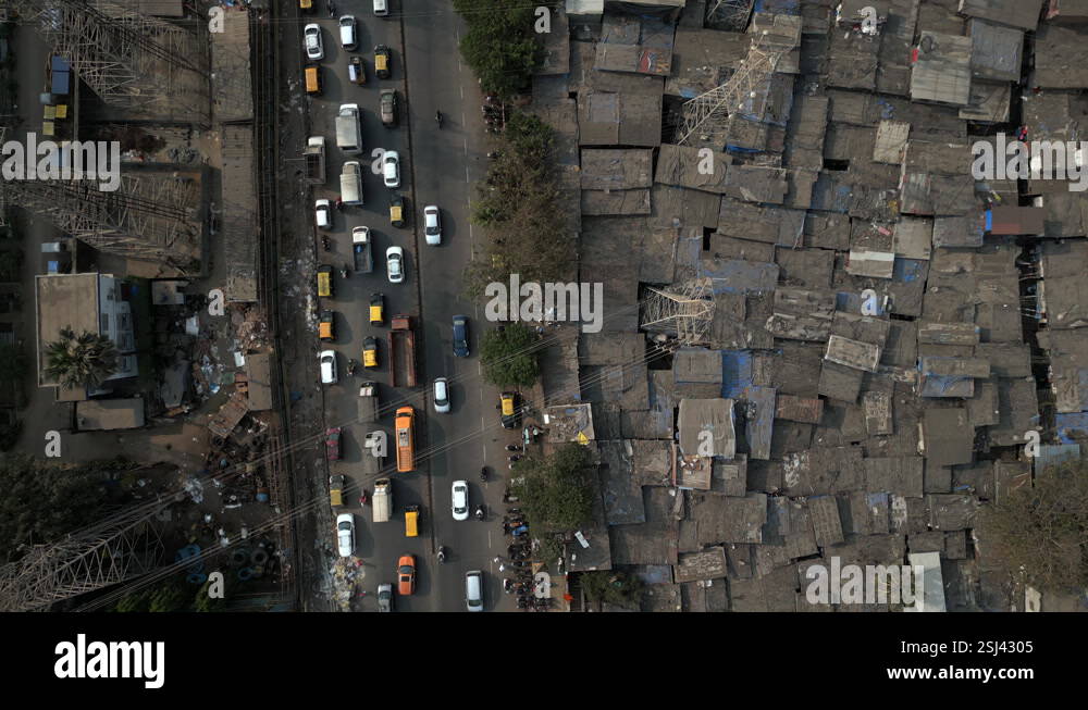 Top Down Aerial View of Dharavi Slums Next to Busy Street in Mumbai, India Stock Video Footage ...