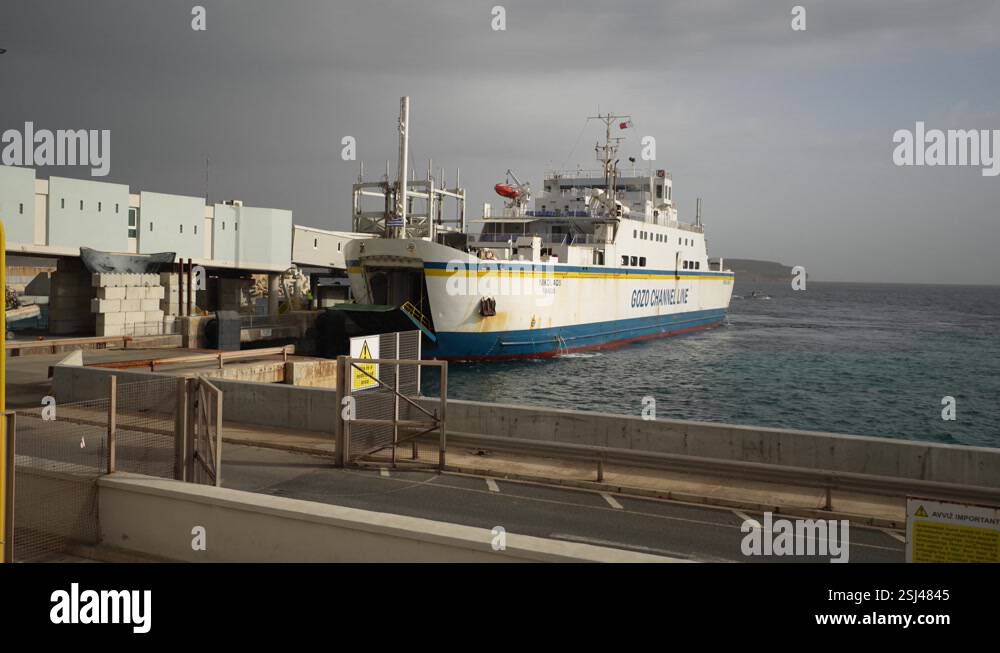 Ferry arriving and docking to load passengers and go back to main ...