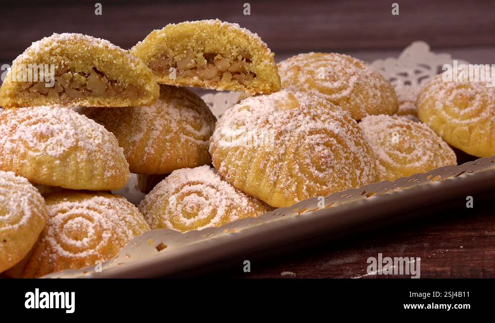 Traditional eid maamoul or mamoul cookies with dates, nuts, and jam ...