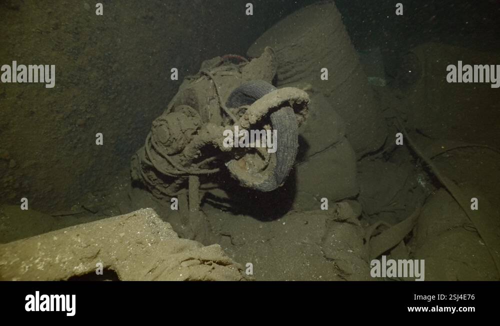 Wheelbarrow, barrels and other cargo inside hold of ferry Salem Express ...