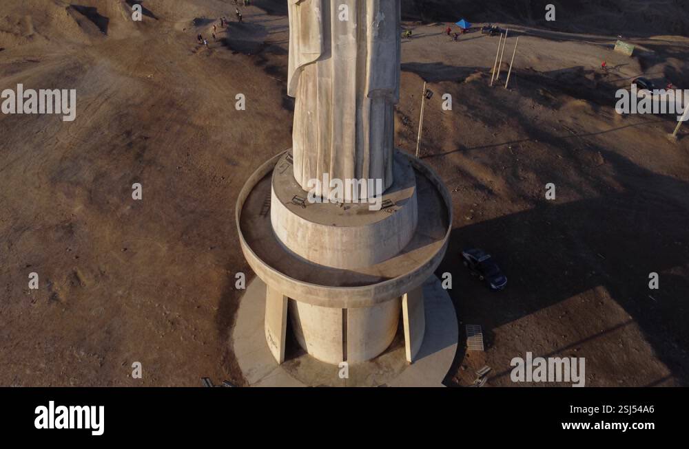Giant statue or sculpture of Jesus Christ. Drone hovers and tilts ...